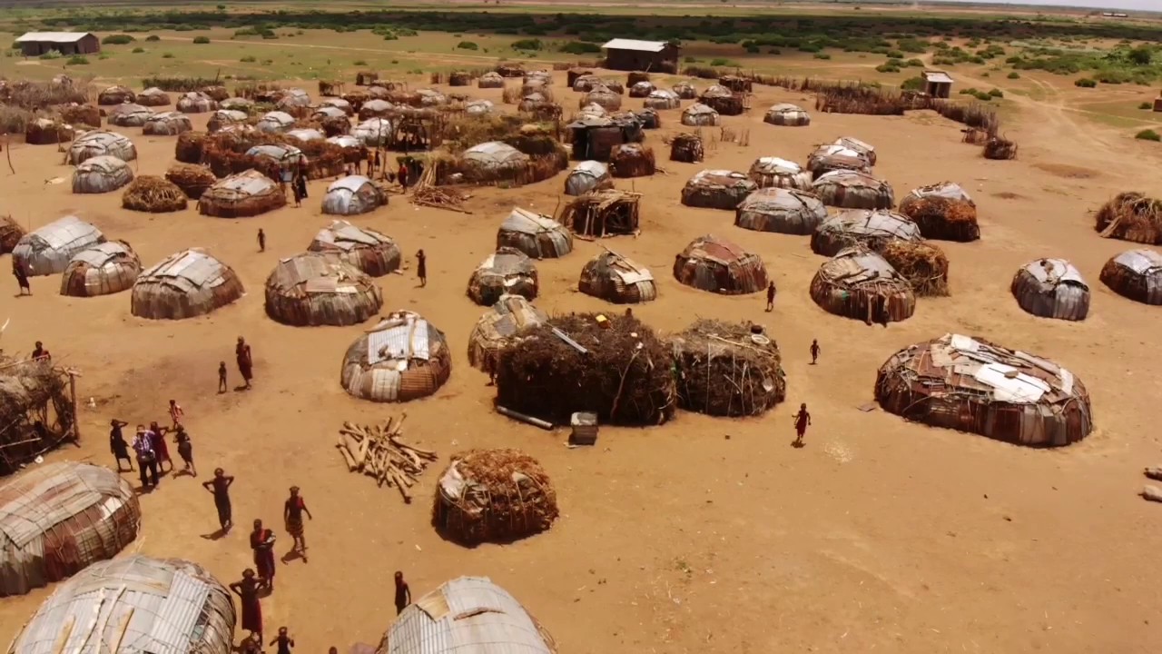 DRONE FOOTAGE OF A DASSANACH TRIBE VILLAGE AND OMO RIVER - LOWER OMO ...