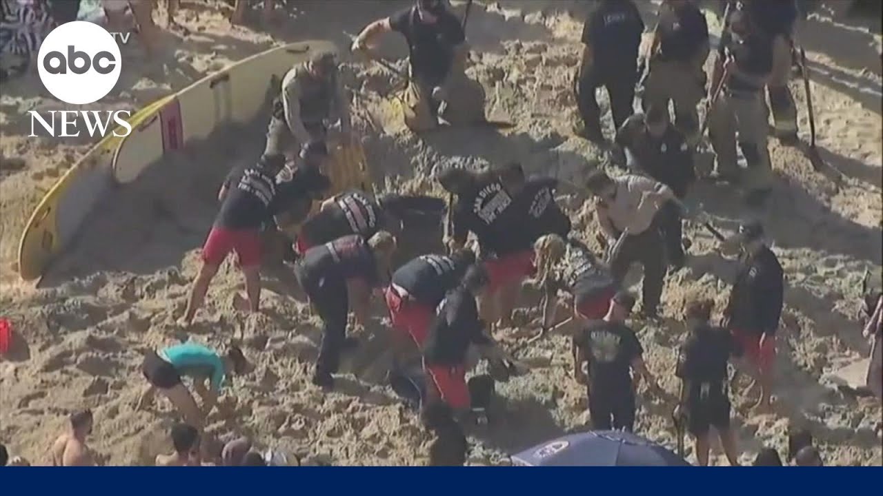 Girl rescued from 6-foot sand hole that collapsed - YouTube