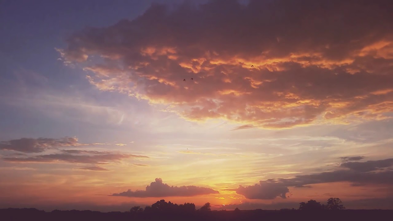Sunny Sunset | Slow Moving Cloud Time Lapse - YouTube