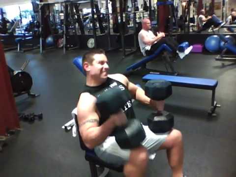 100 lb dumbell military press - YouTube
