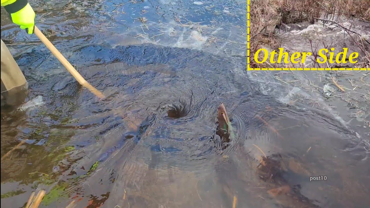 Unclogging Culverts Under Frozen Pond To Drain Flooded Road With Huge ...