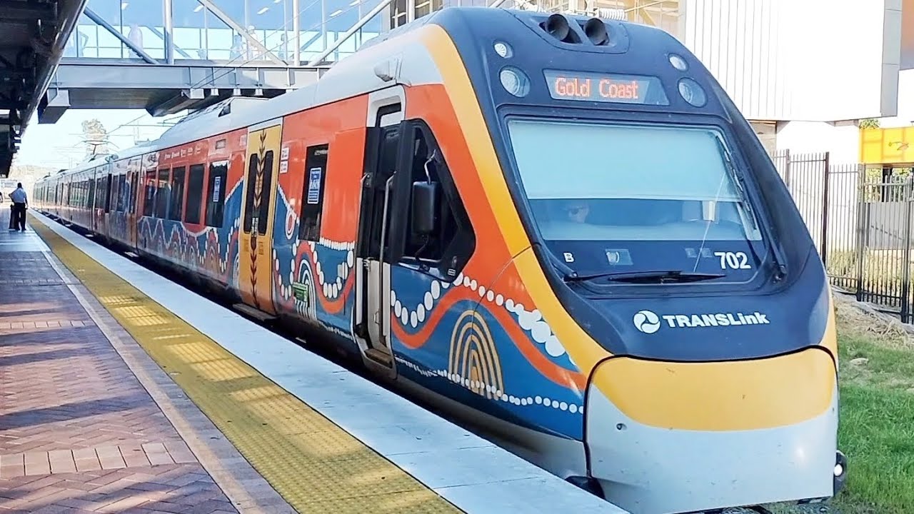 Queensland NGR train wrapped in indigenous artwork - Helensvale station ...