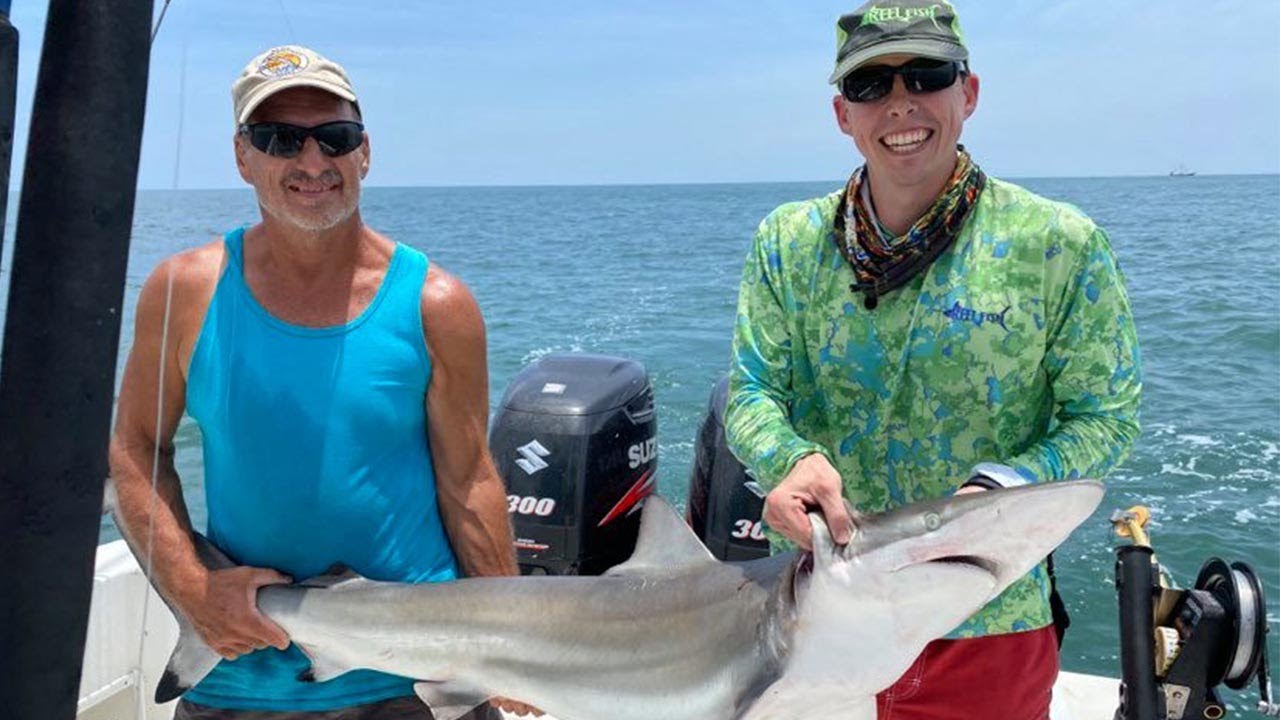 Catching Sharks off the Beach behind Shrimp Boats - YouTube