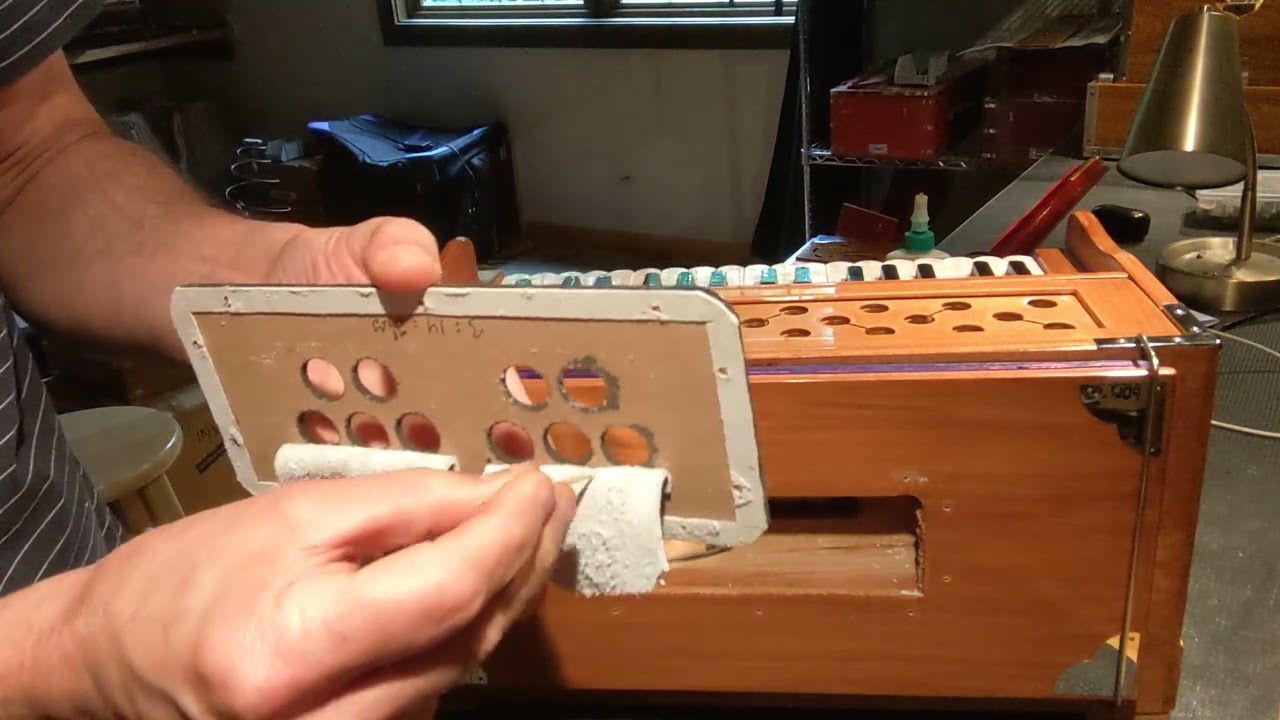 Addressing clicking type noises from harmonium bellows - YouTube
