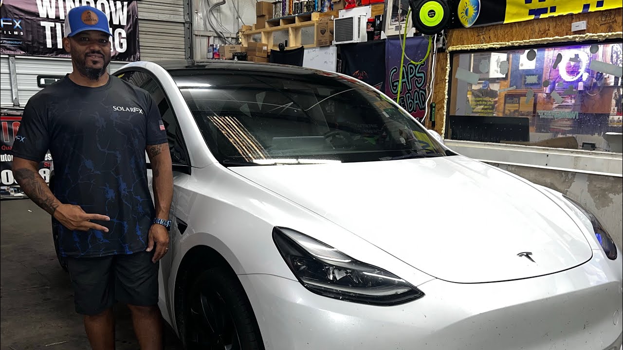 Bottom loading Tesla model Y - YouTube