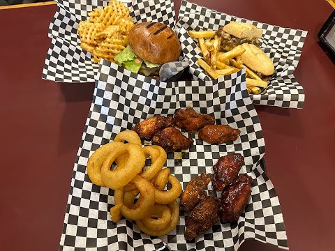 Off The Rails Cafe offers wings and burgers along with family ...