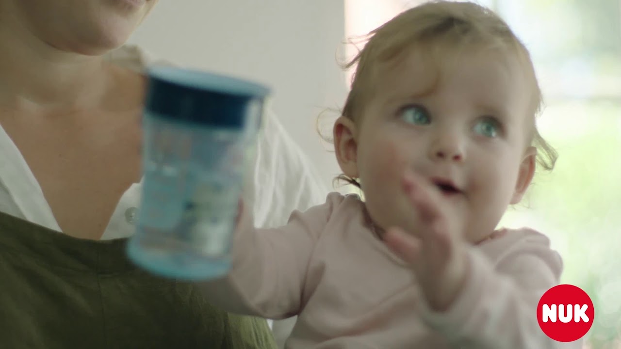 Copo Magic Cup 360° NUK Evolution - YouTube