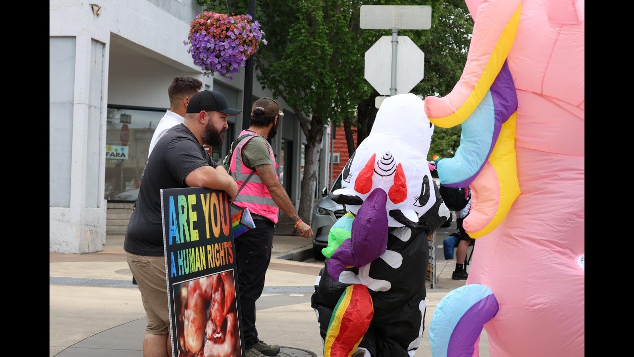 Evangelism, Open air preaching, signs at parade-DC Pride Roseburg ...