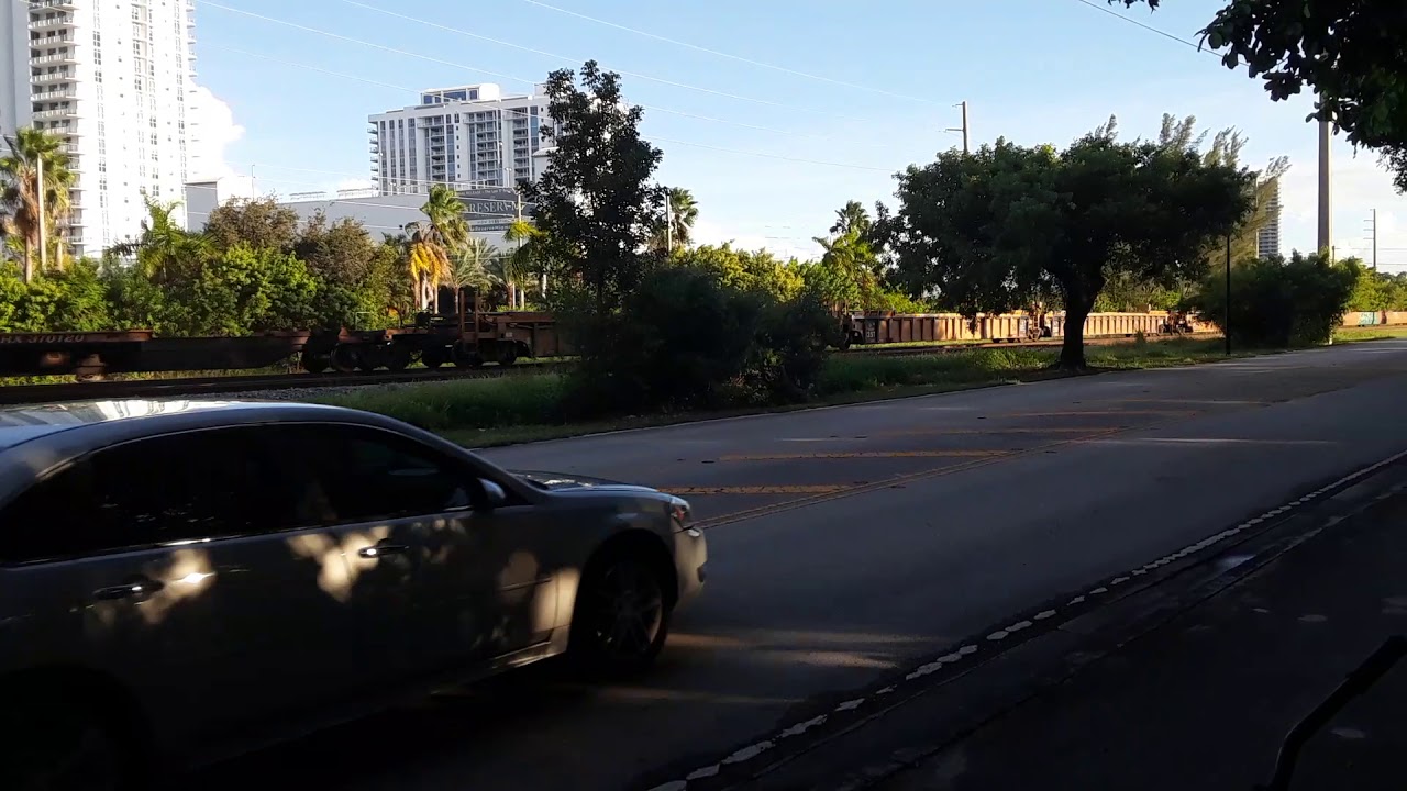 FEC 202 with with two Es44c4's and a LNG tender. Through north miami ...