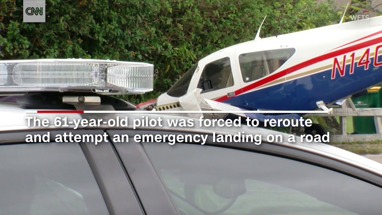 Watch plane buzz cop car in crash - YouTube