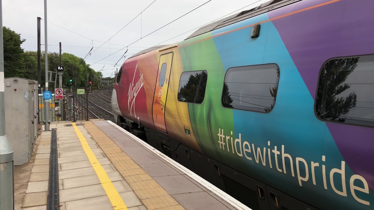 Virgin trains pendolino 390045 and virgin trains voyagers 221115 and ...
