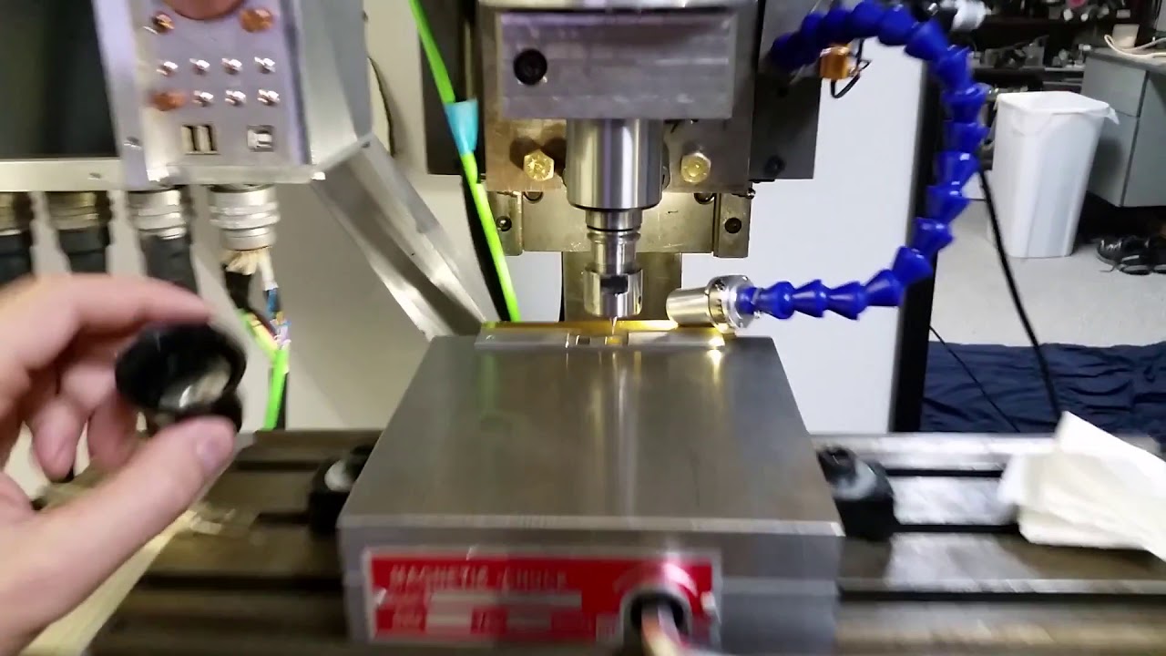 CNC engraving the Linux logo - YouTube