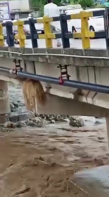 A man is stuck under the Chakdara bridge, people are trying to rescue ...