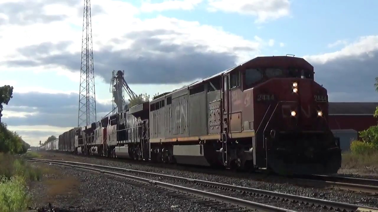 CN 2444 CN 2296 CN 2237 CN 2226 Leading a massive train eastbound ...