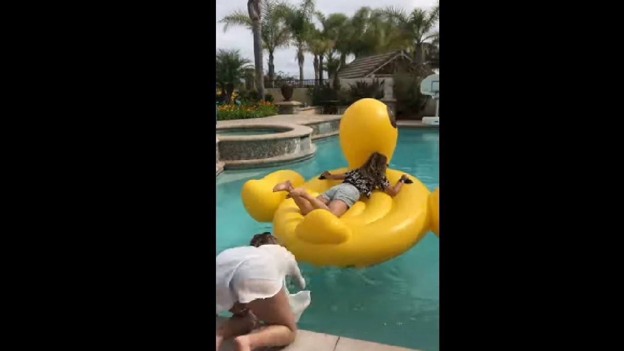 Girl Falls Into The Pool While Taking A Picture Of Her Friend - YouTube
