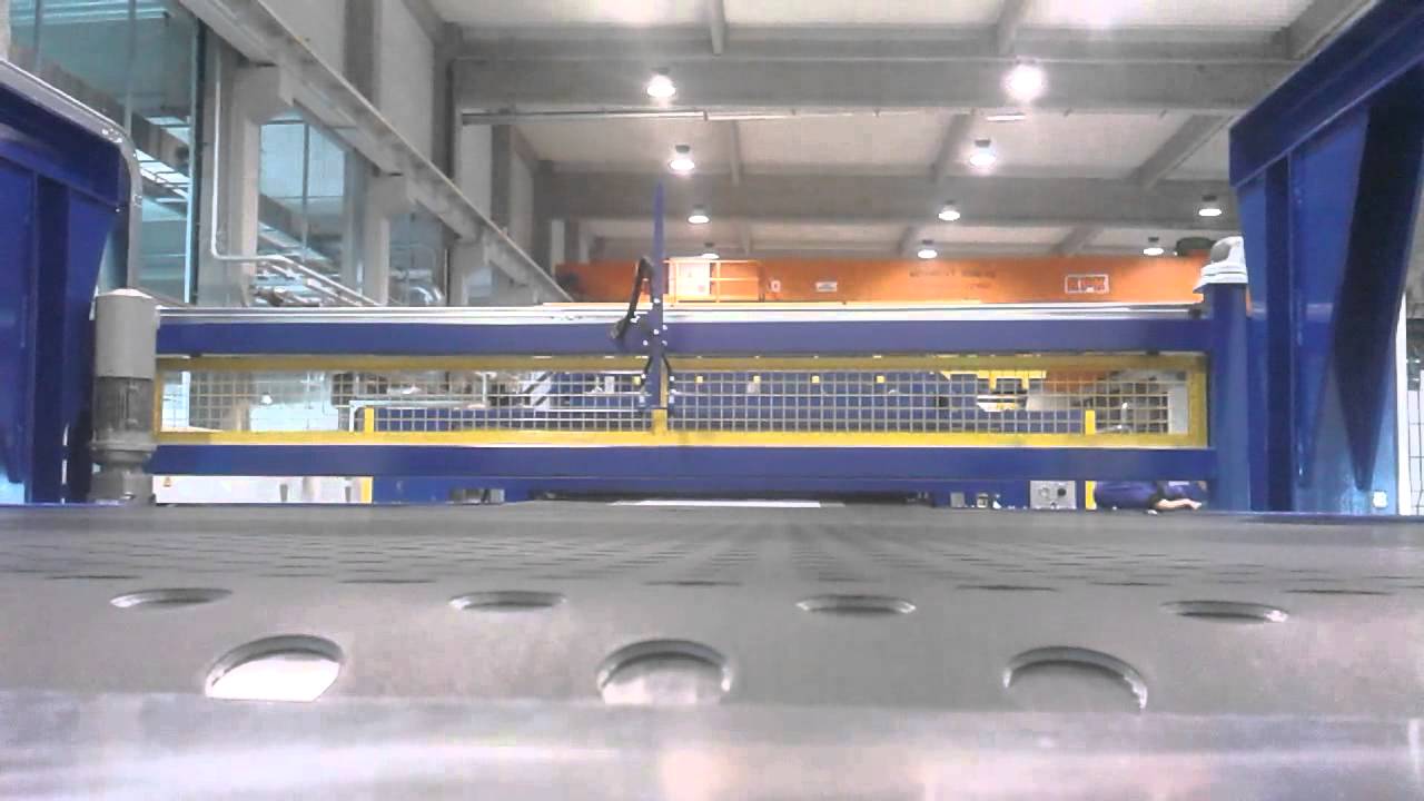 Cutting and stacking system for rigid automotive products 2 - YouTube