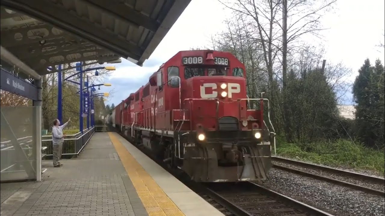 Two CP trains at the Maple Meadows station - YouTube