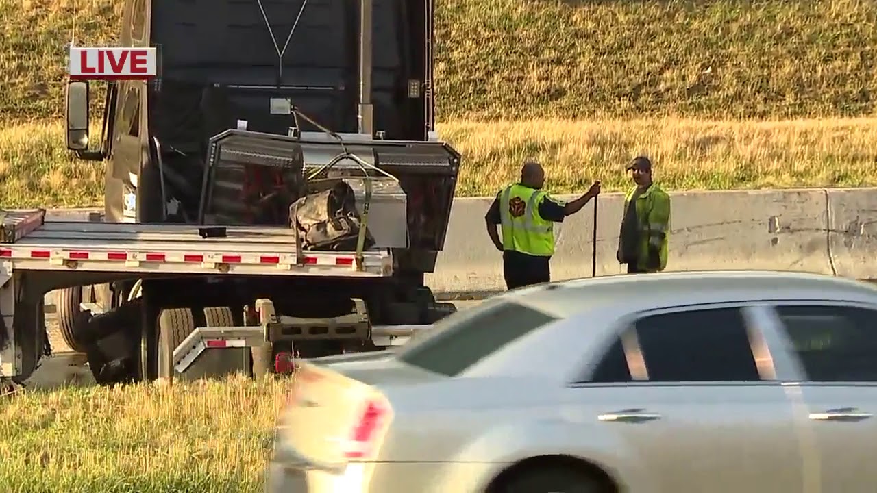 Semi truck spill causes all lanes to close on NB I-75 after I-96 - YouTube