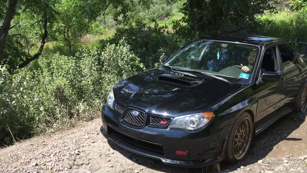 Lowered STi off roading - YouTube