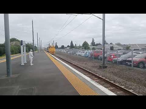 Te Huia Train Speeding Through Takanini - YouTube