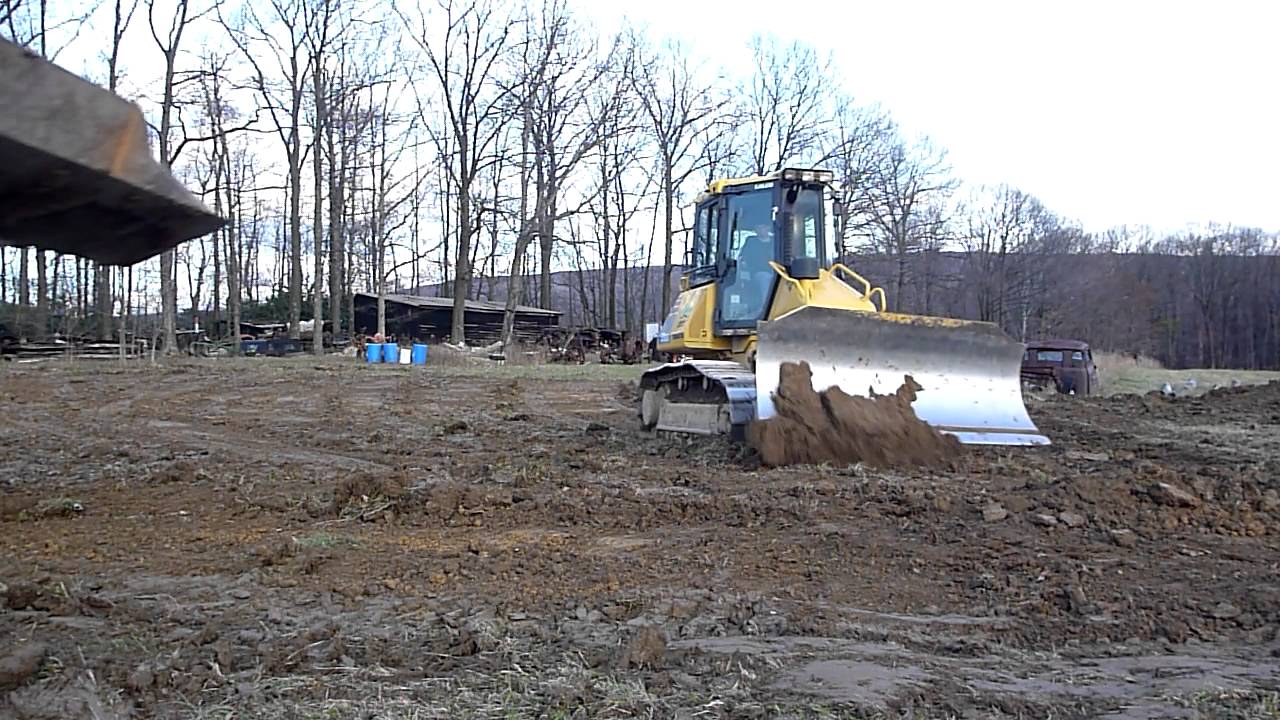 Komatsu D51 and Case 580L Turbo Team Work - YouTube
