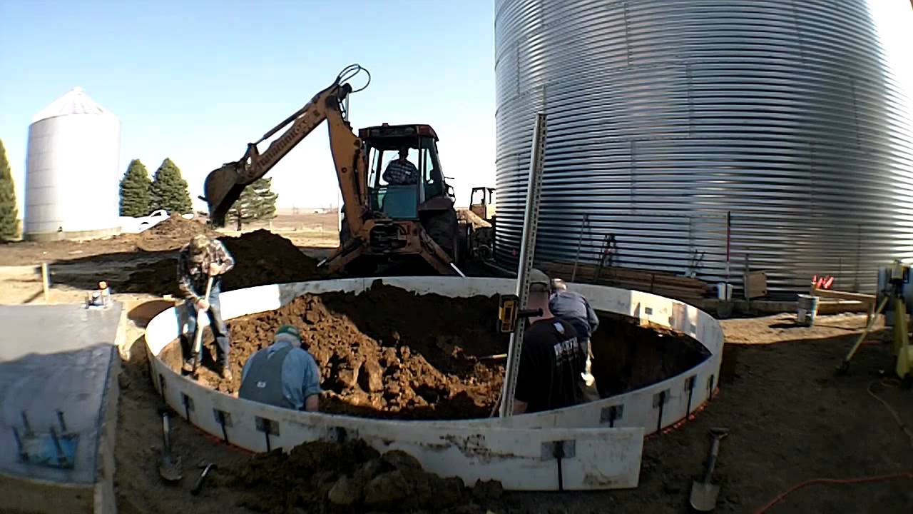 Digging a round hole for a grain dryer cement base (timelapse) - YouTube