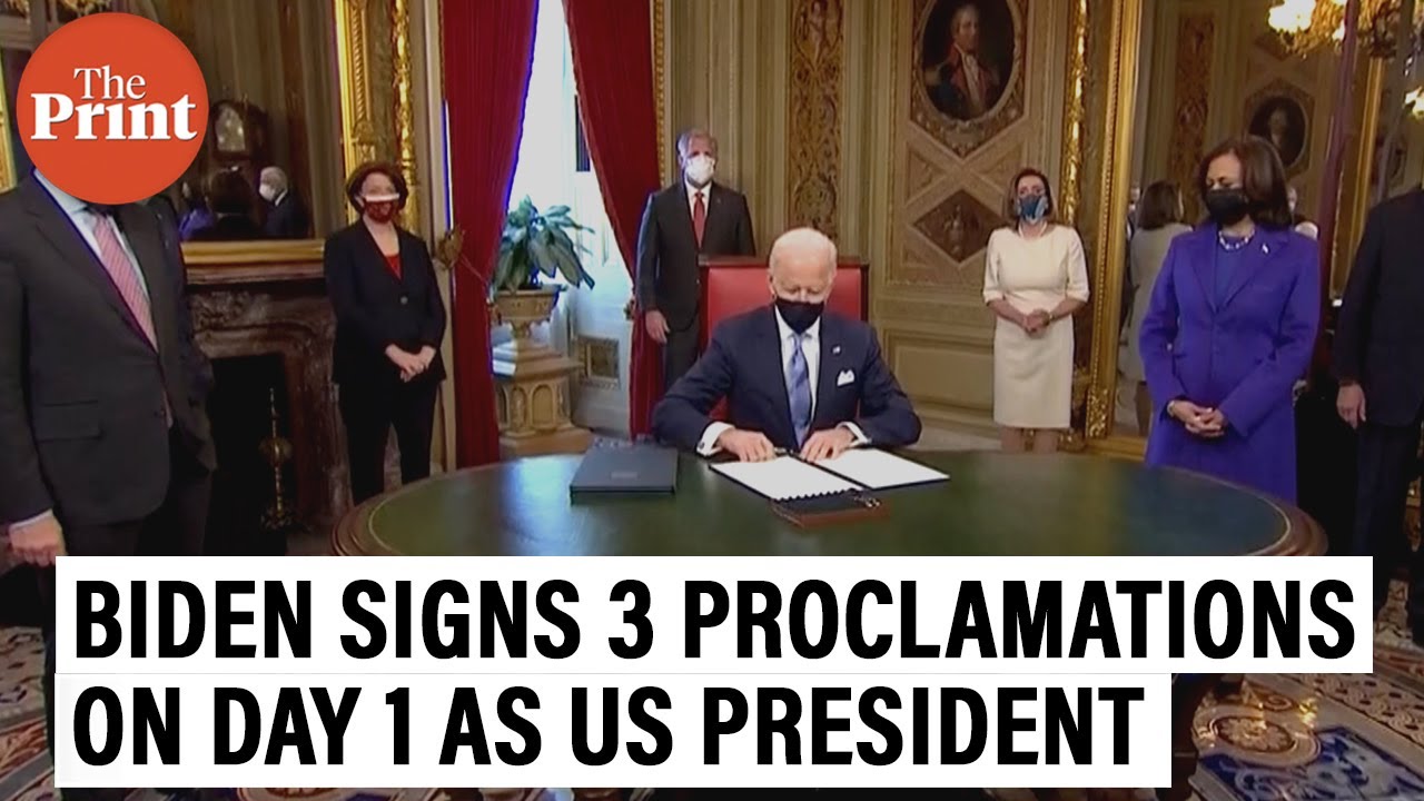 Joe Biden signs his first 3 proclamations as US president - YouTube