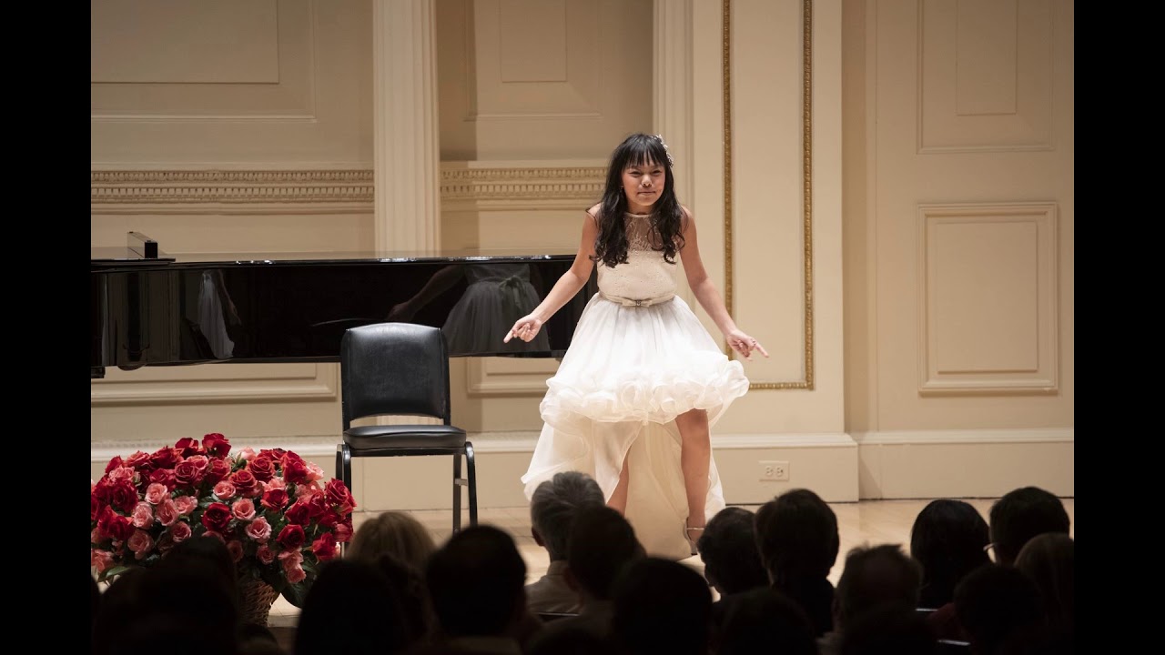 Gisele Chiam singing “I Enjoy Being a Girl” at Carnegie Hall, New York ...