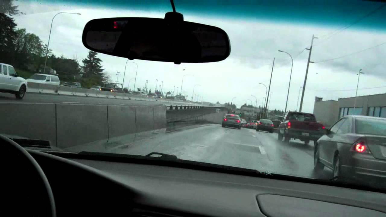 Truck Crashes into Car on Freeway Exit - YouTube