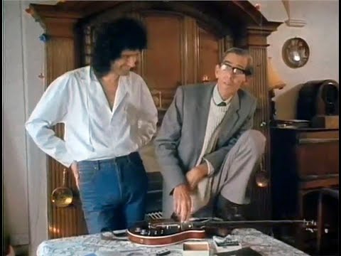 Brian May and his Dad, Harold May showing Red Special Guitar