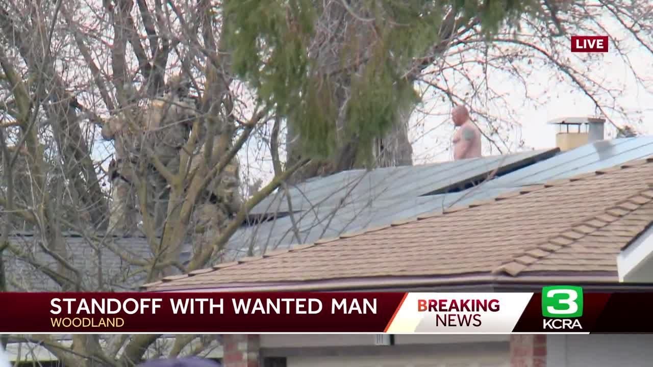 Standoff with possibly armed man on roof in Woodland continues - YouTube