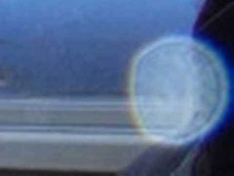 Orb with ghost child face - YouTube