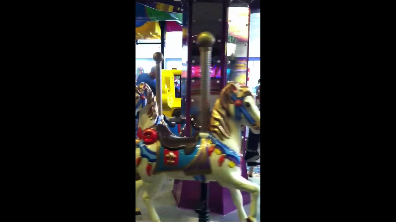 Reese Deskins loving the carousel at chuck e cheese - YouTube