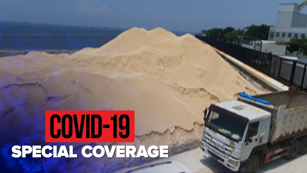 DOH flags 'white sand' project in Manila Bay - YouTube
