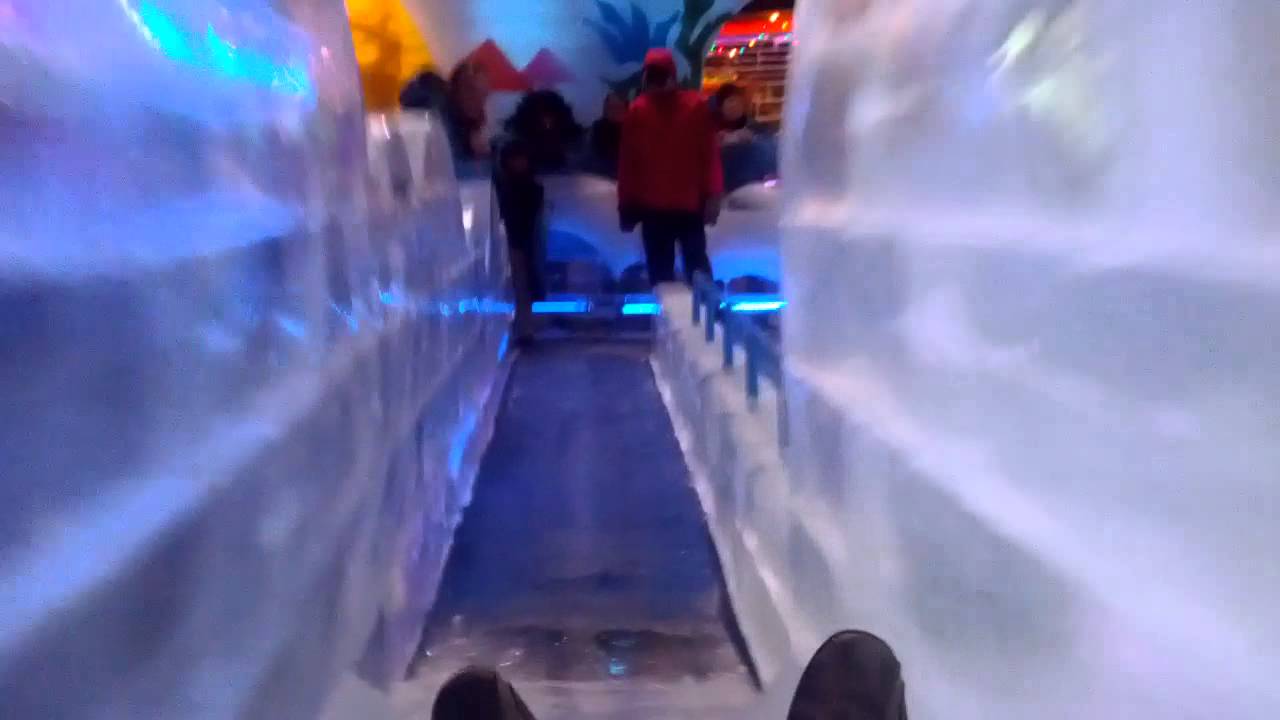 Riding the ice slide at ICE! at Gaylord Texan. - YouTube