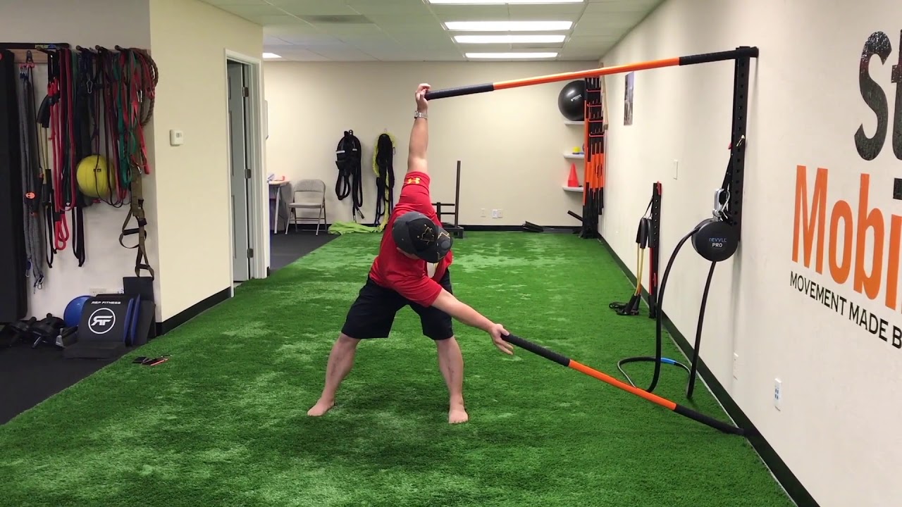 Thoracic Spine Rotation Wall Drill - Stick Mobility Exercise - YouTube