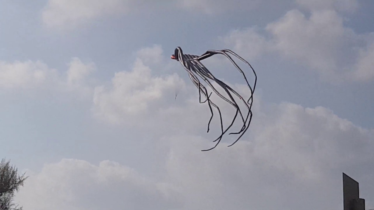 A UFO took over the city sky - giant kite in the air (octopus). Tel ...