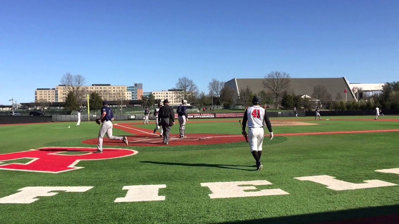 Rutgers football player steals the show on baseball field - YouTube