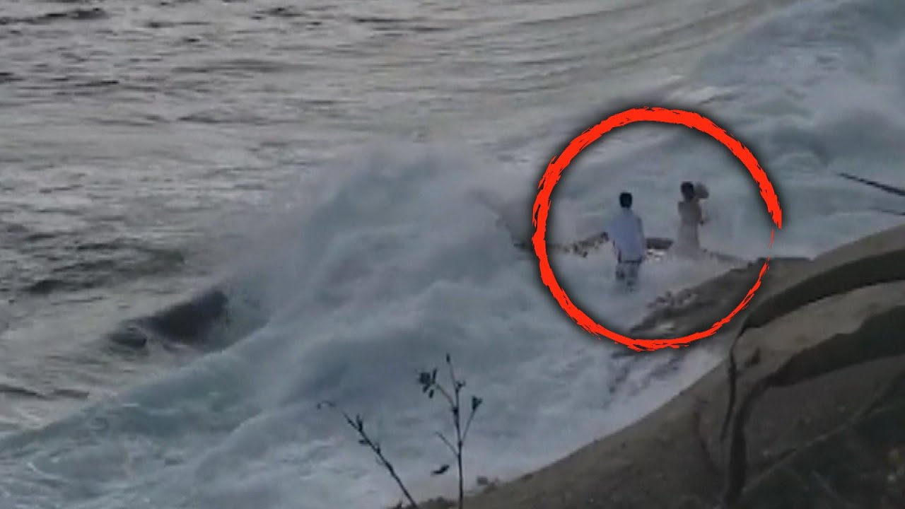 Newlyweds Rescued After Being Swept Into Ocean While Taking Photos ...