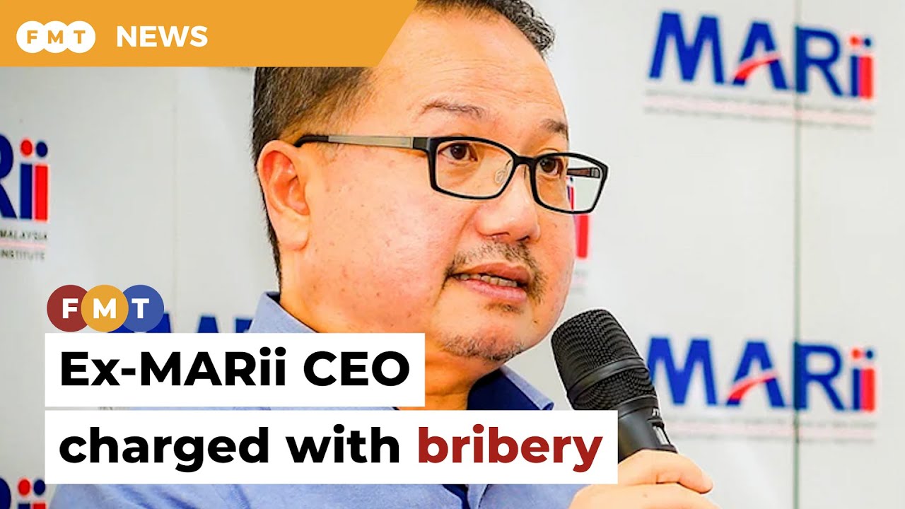 Ex-MARii CEO charged with accepting RM5mil bribe - YouTube