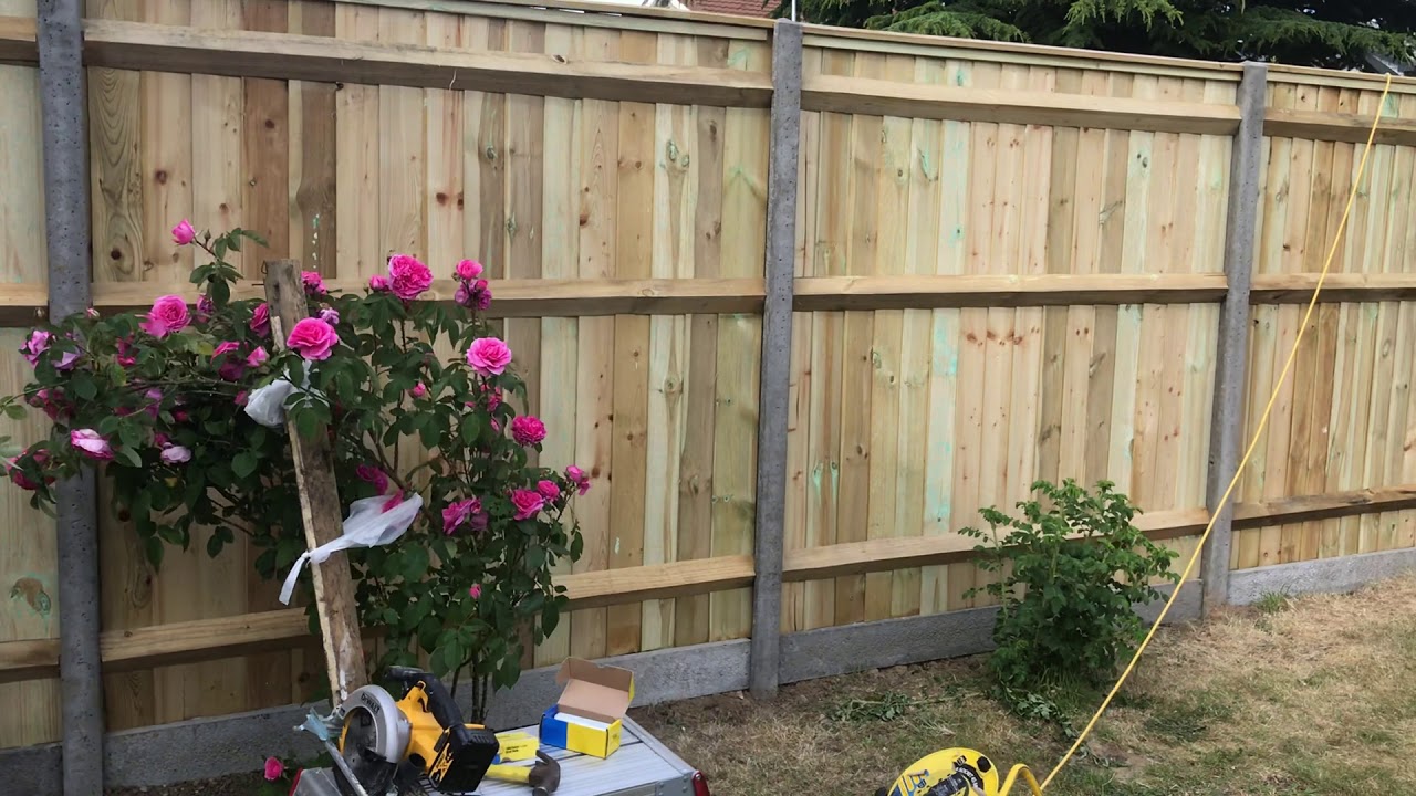 Concrete post and concrete footing fence day2 result - YouTube