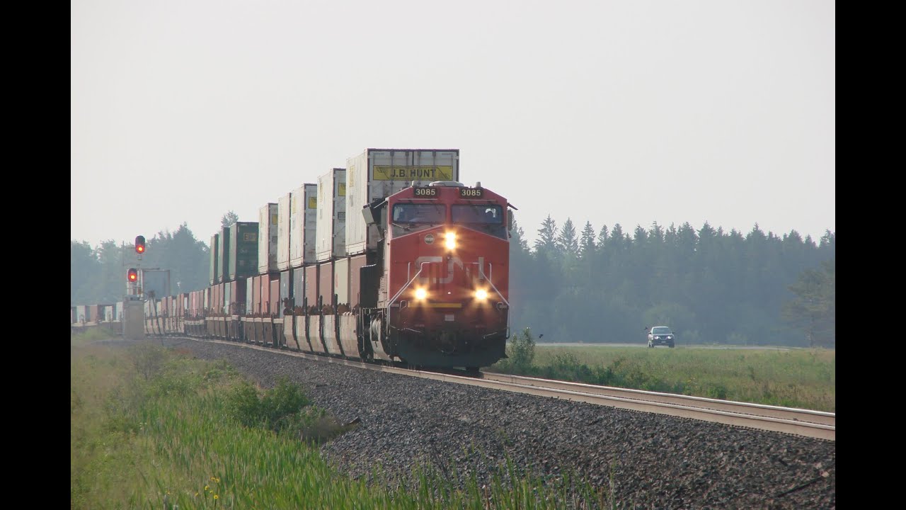CN Intermodal with CN (ET44AC #3085 & CN (ES44AC) (DPU) #2874 Warroad ...