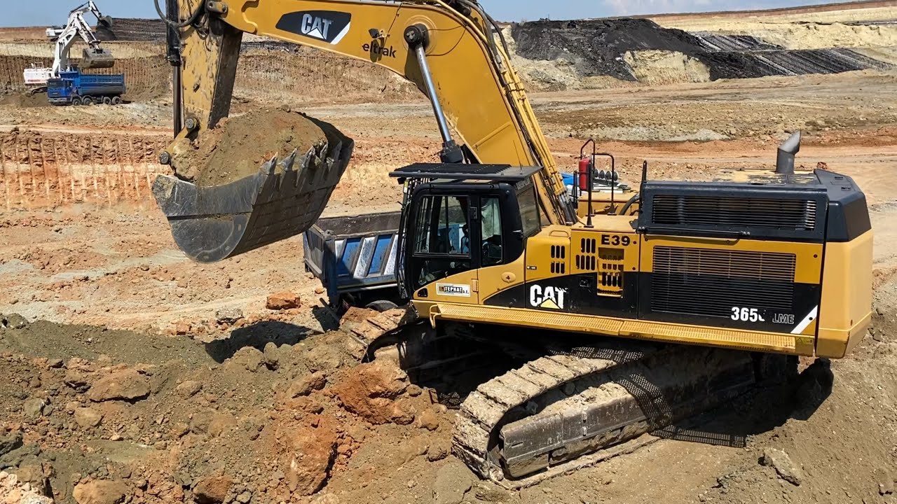 Caterpillar 365C Excavator Loading Trucks - Interkat SA - YouTube