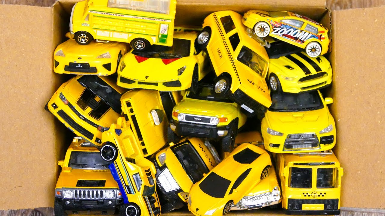 A Box Full Of Diecast Model Luxury YELLOW Cars / FORD, HUMMER, CAMARO ...