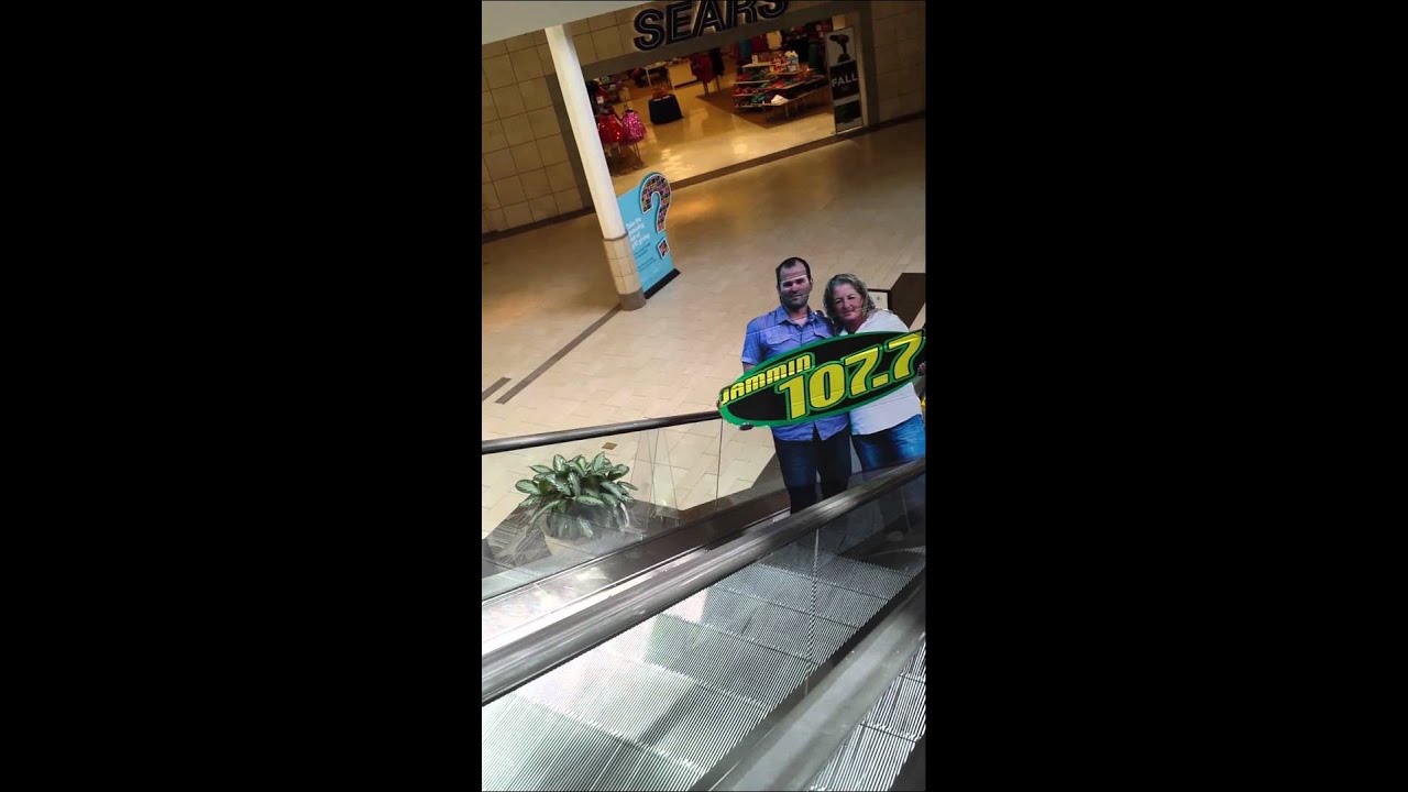 Creeping a guy out on the escalator at the mall - YouTube