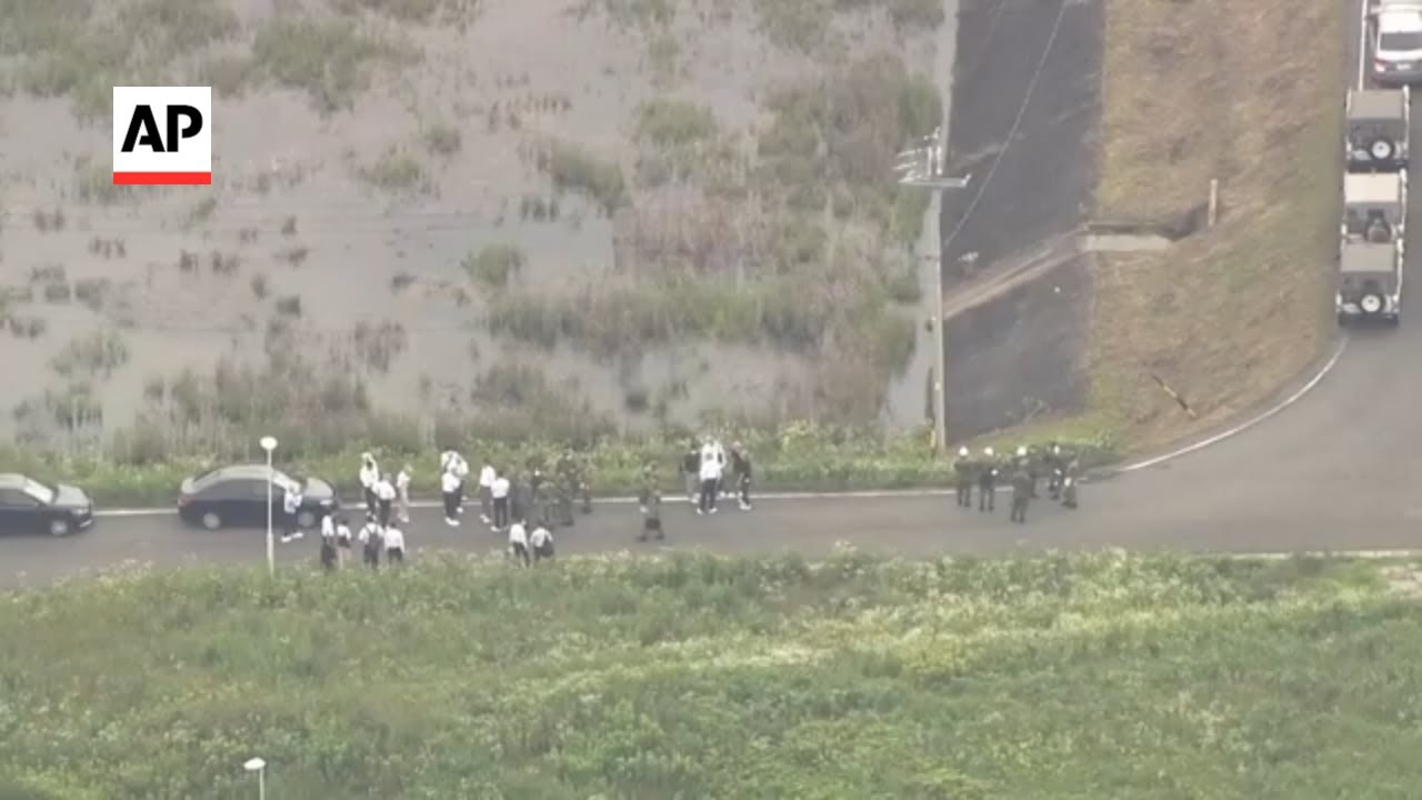 Shooting at Japan army base kills two - YouTube