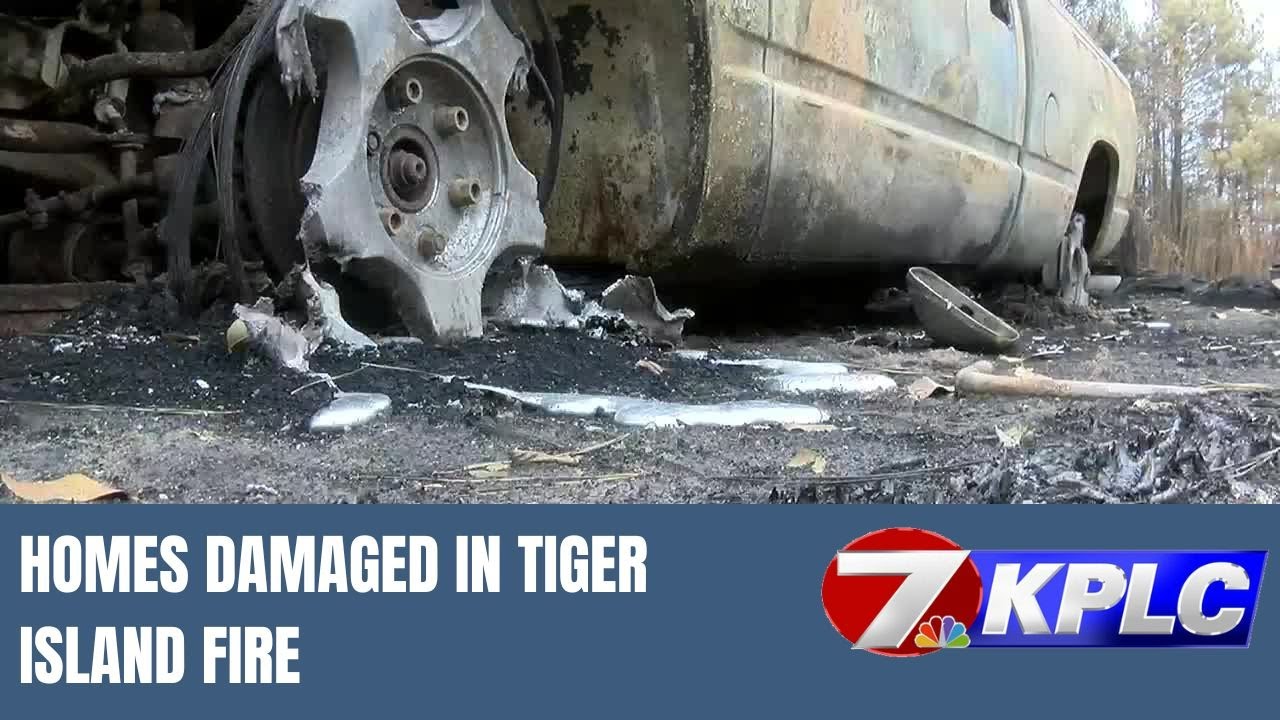 Homes damaged in Tiger Island Fire; approx. 20 structures burned - YouTube