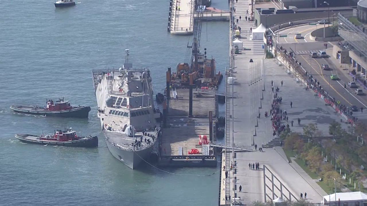 USS Detroit docks in downtown Detroit in front of Renaissance Center ...