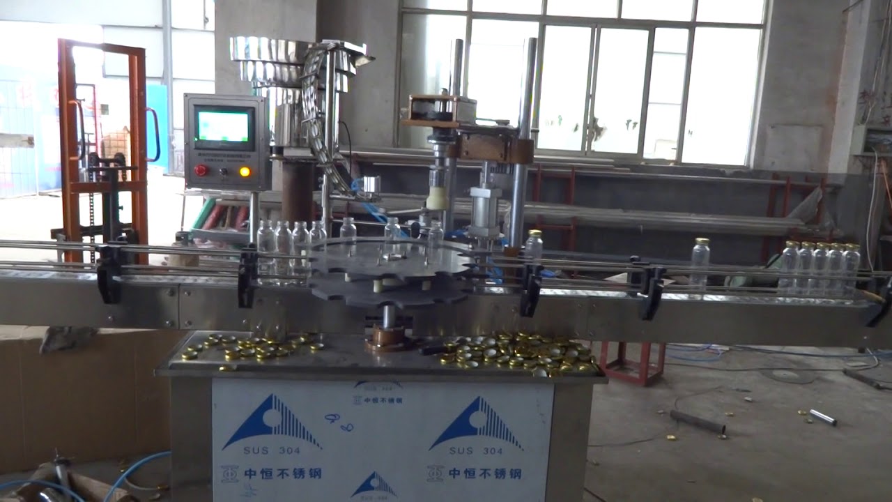 automatic glass bottle screw cap capping machine / capper - YouTube