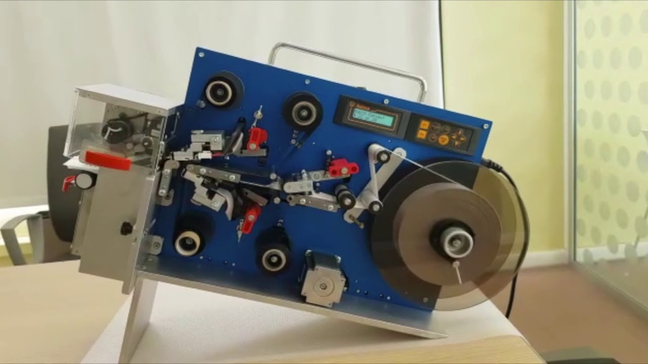 Apix Tex: Stampante per etichette in tessuto fronte retro - YouTube